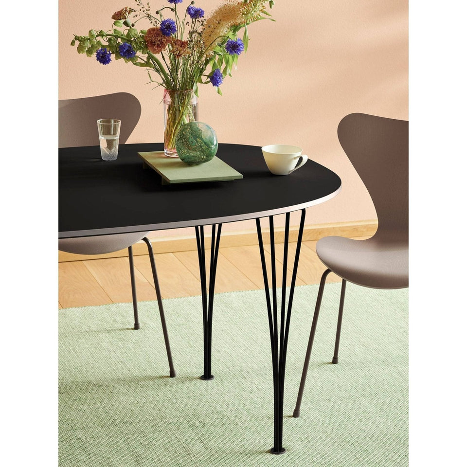 Super-Ellipse™ table by Fritz Hansen | Shop at Skandium London